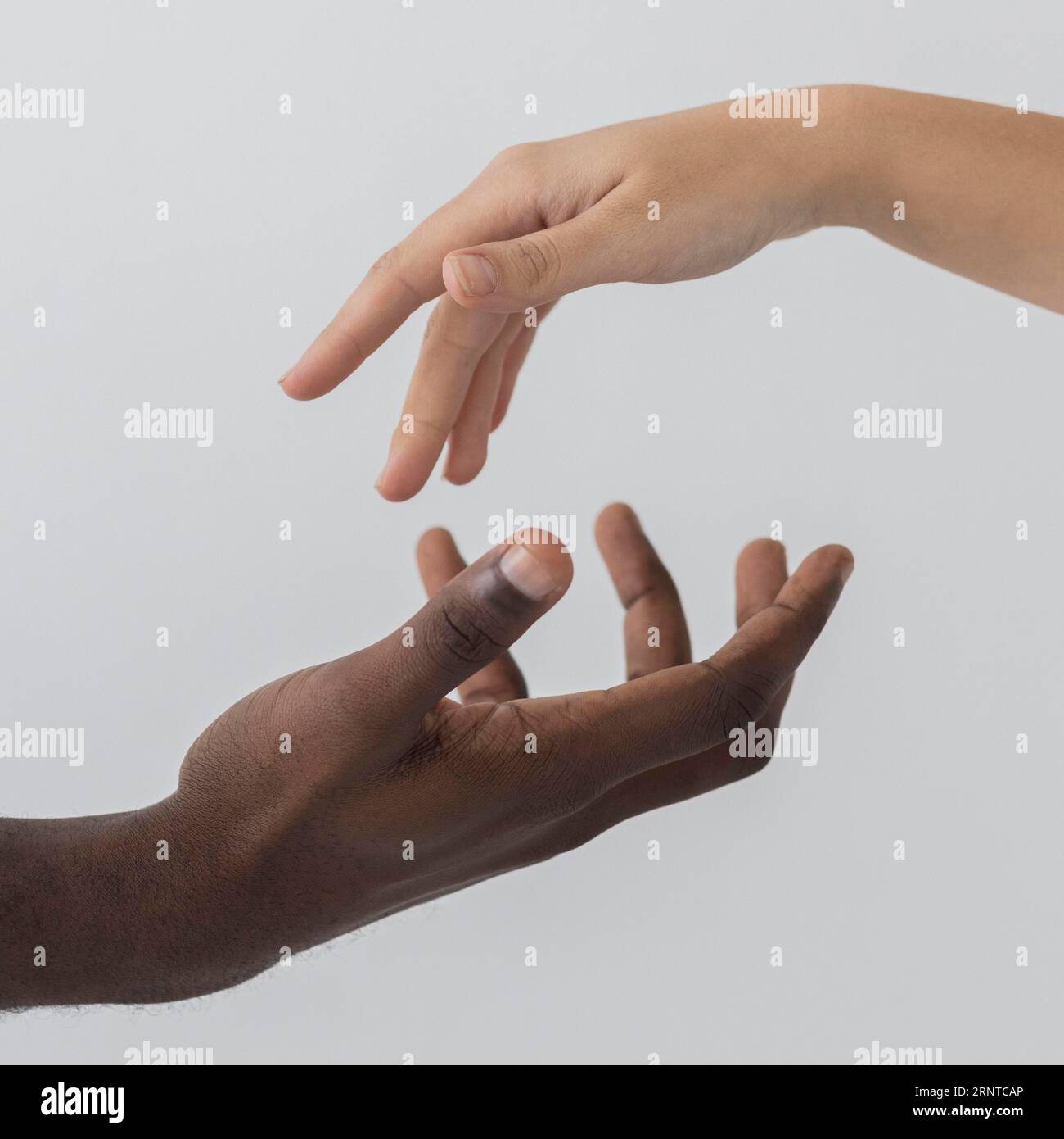 Black white hands hi-res stock photography and images - Alamy