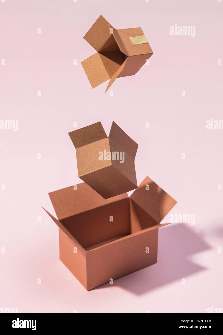 Boxes arrangement pink background Stock Photo - Alamy