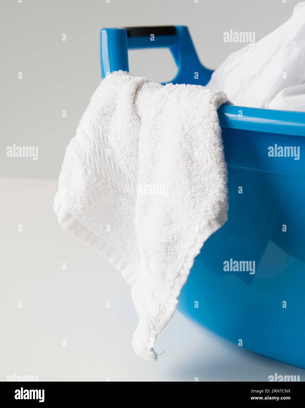 Full laundry basket hi-res stock photography and images - Alamy