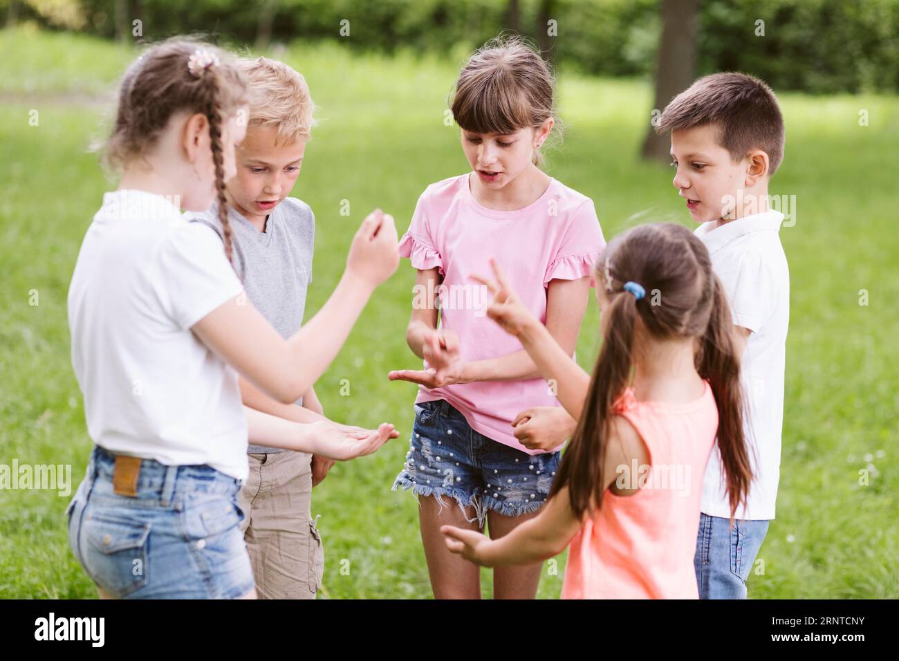 Rock paper scissors play children hi-res stock photography and images ...