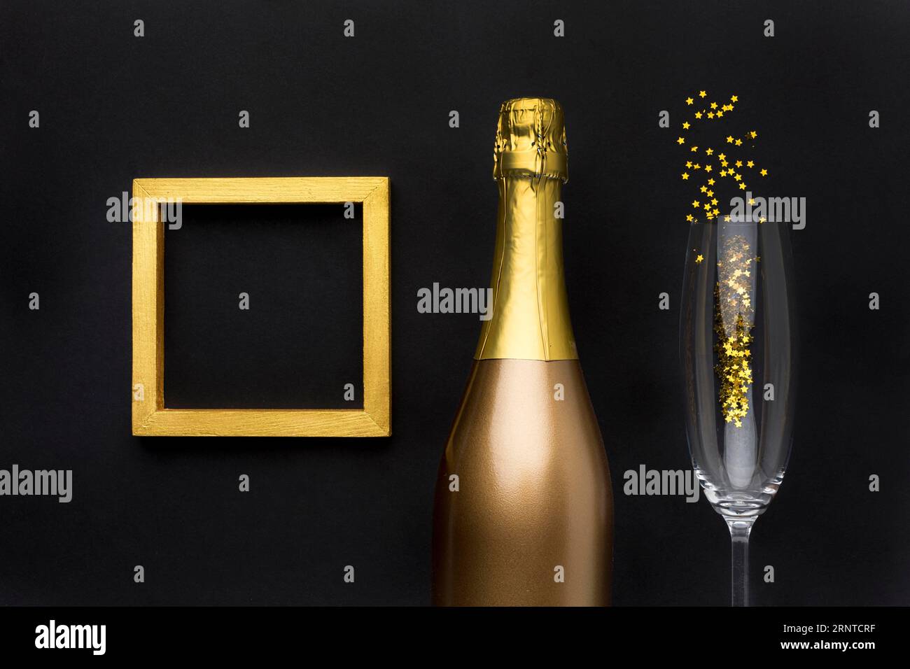 Champagne bottle with glass frame Stock Photo - Alamy