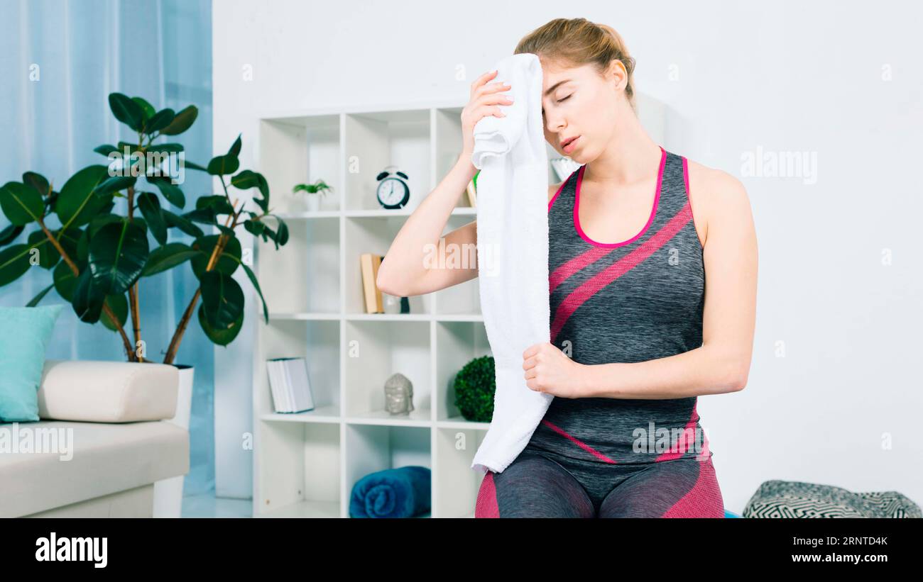 Wiping sweat hi-res stock photography and images - Alamy