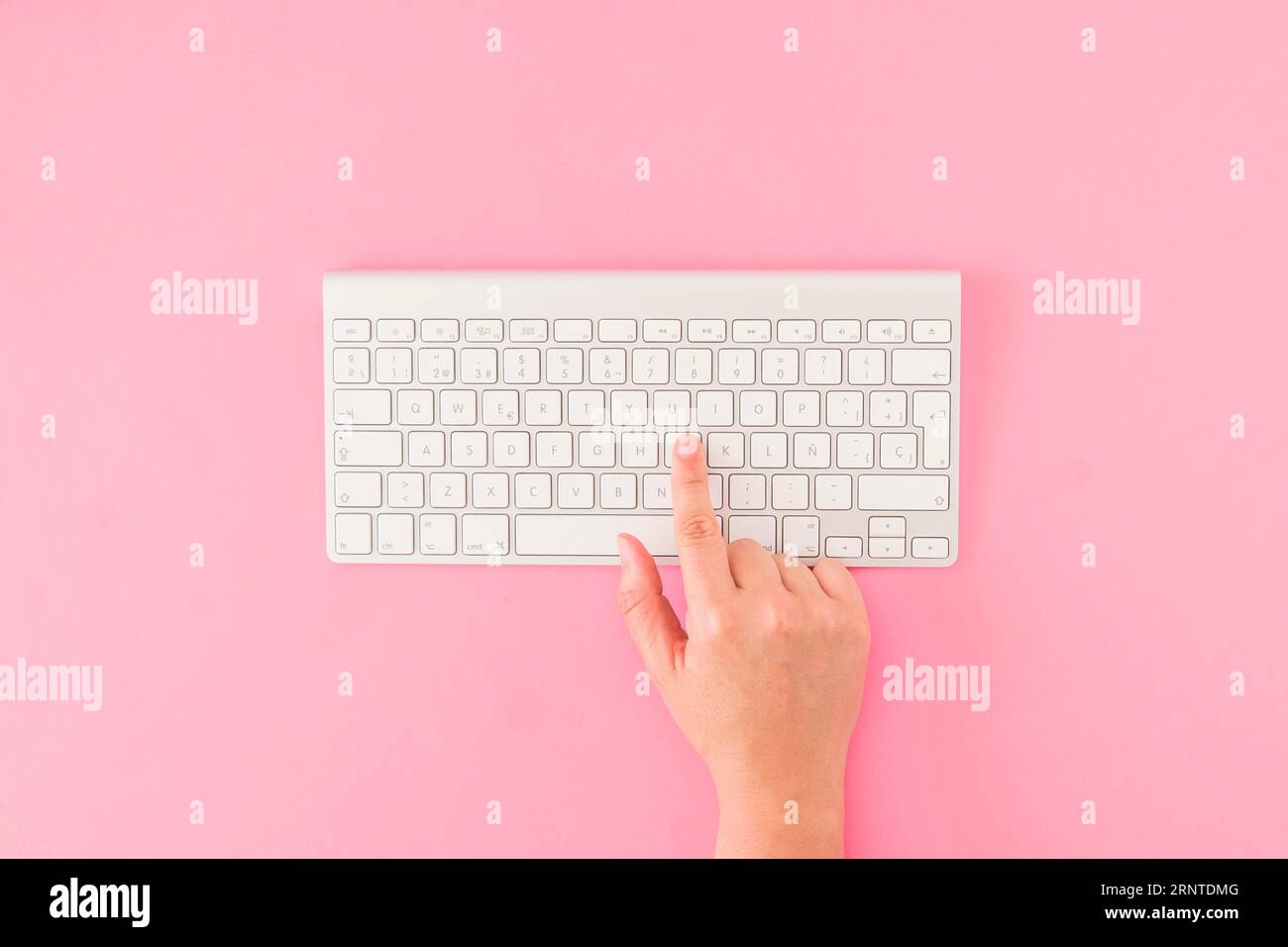 Crop hand pushing buttons keyboard Stock Photo - Alamy