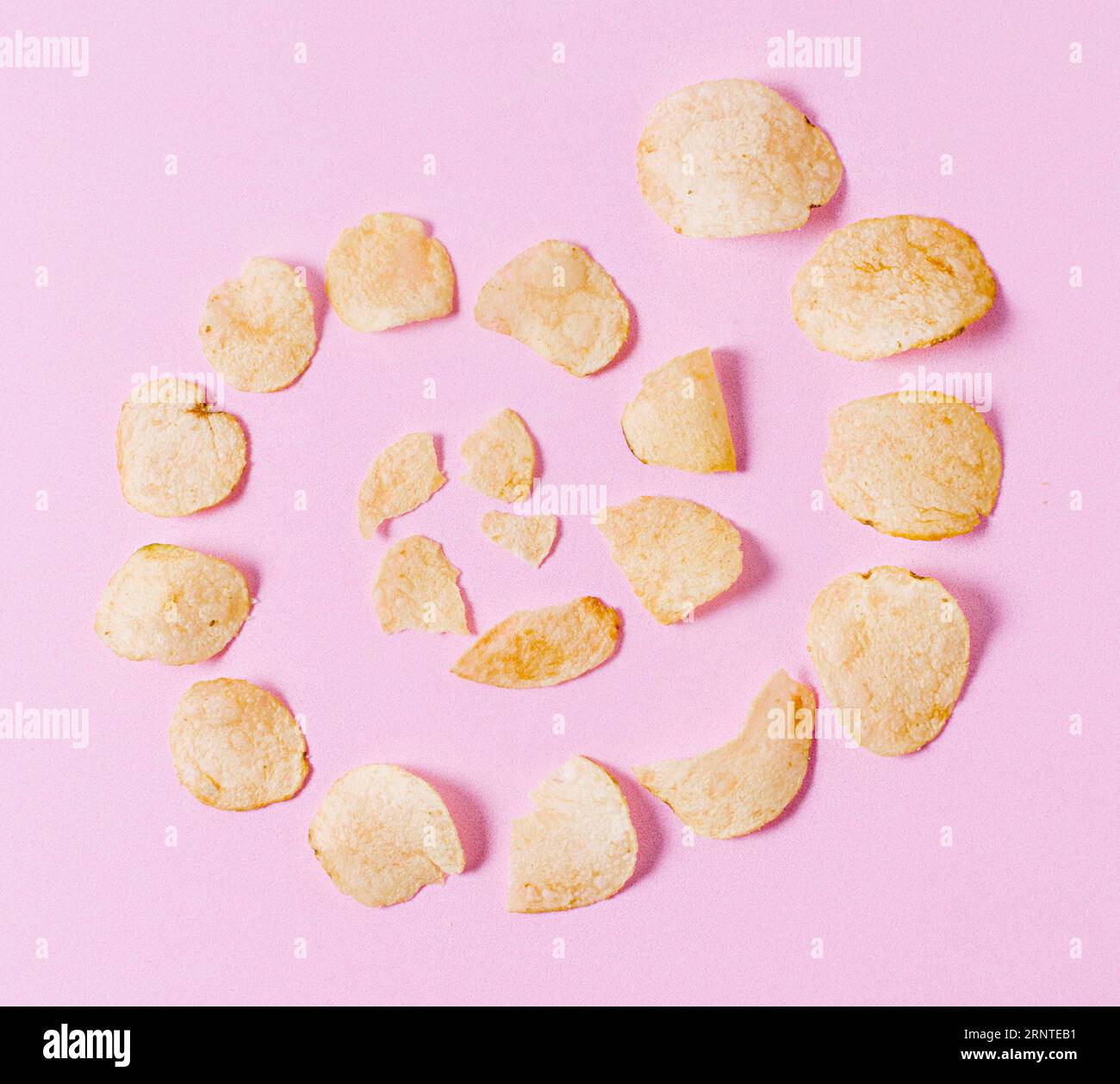 Flat lay spiral made potato chips Stock Photo - Alamy