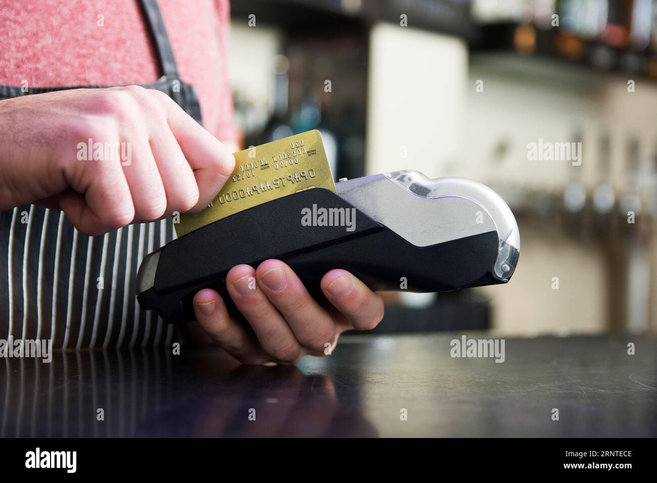 Hand swiping credit card hi-res stock photography and images - Alamy