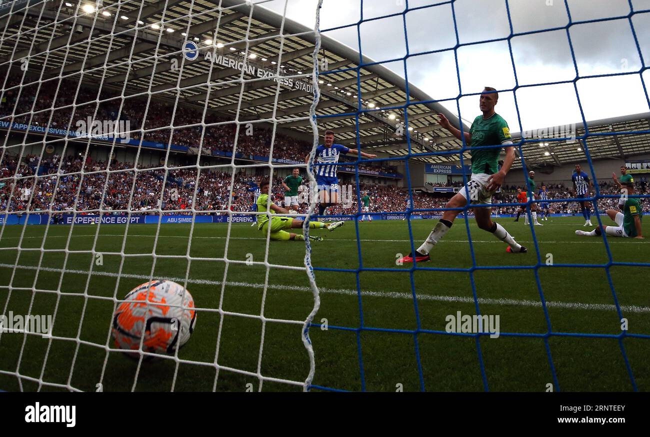 Brighton and Hove Albion's Evan Ferguson scores their side's first goal ...