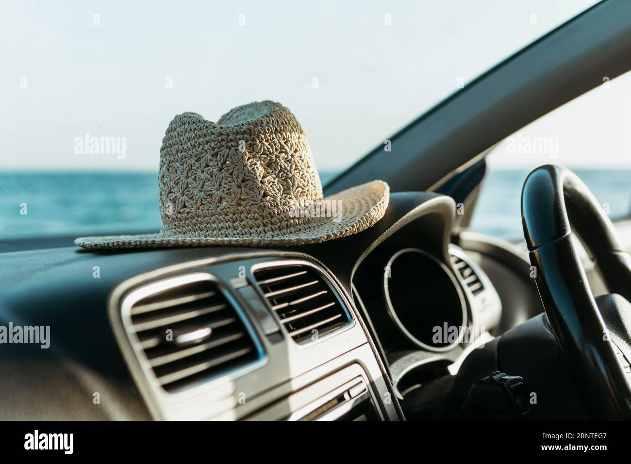 Hat standing car board Stock Photo - Alamy