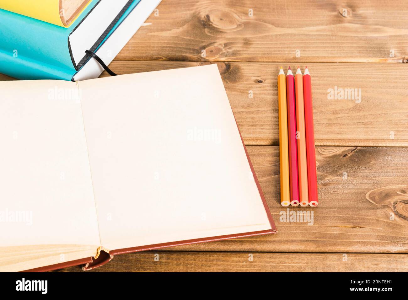 Layout textbook pencils Stock Photo - Alamy
