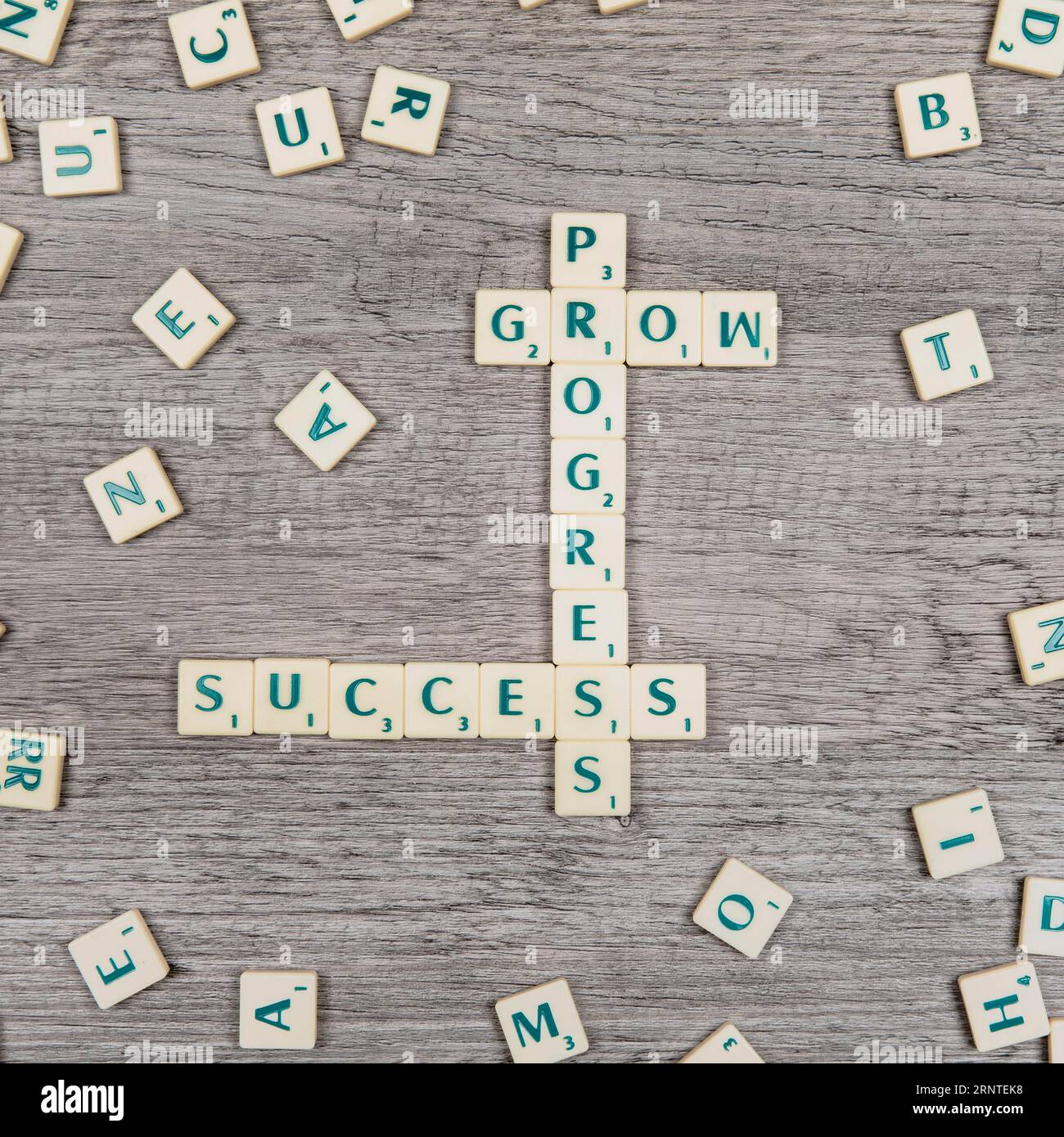 Letters forming words progress grow success Stock Photo - Alamy