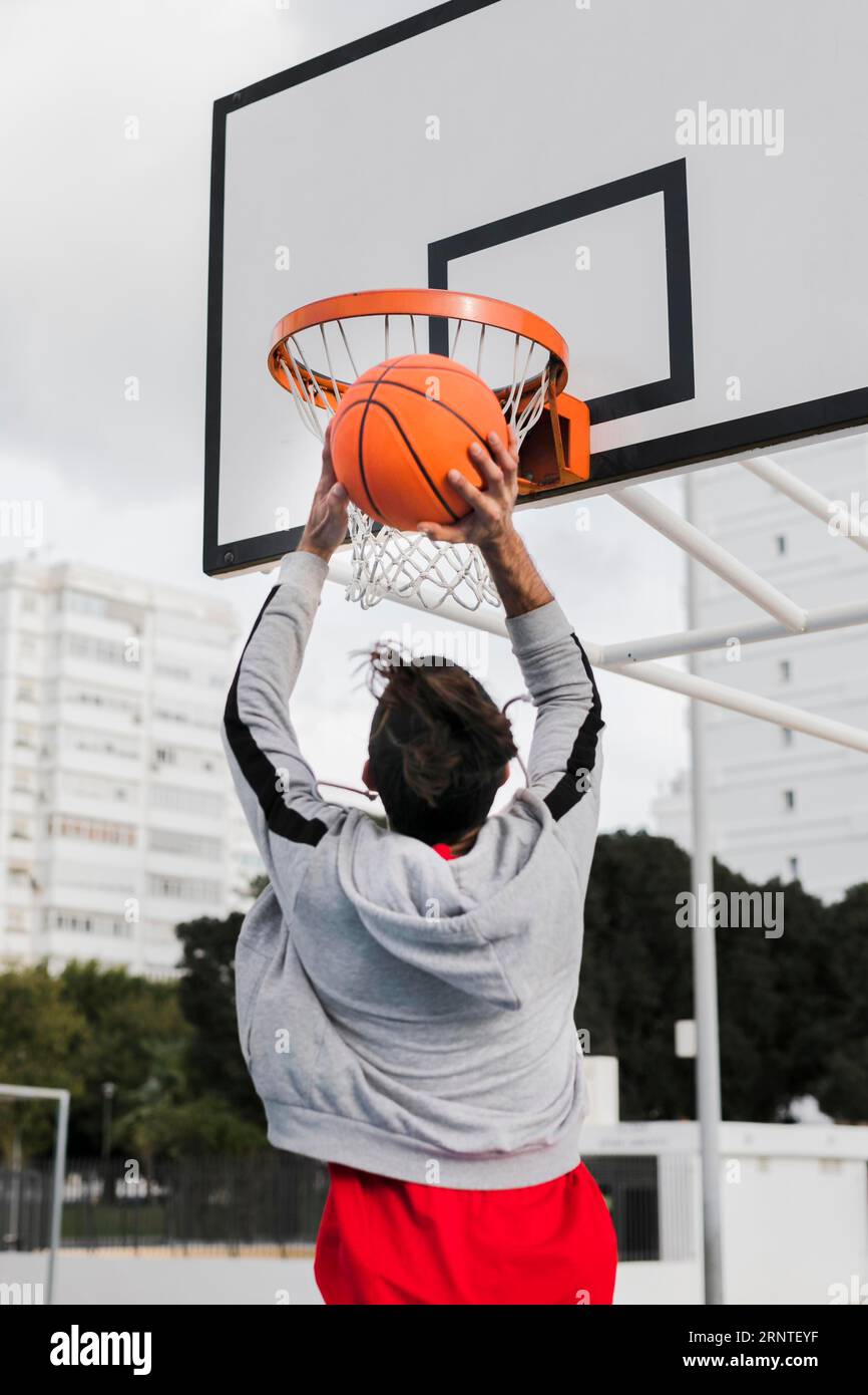 Throwing the hoop hi-res stock photography and images - Alamy