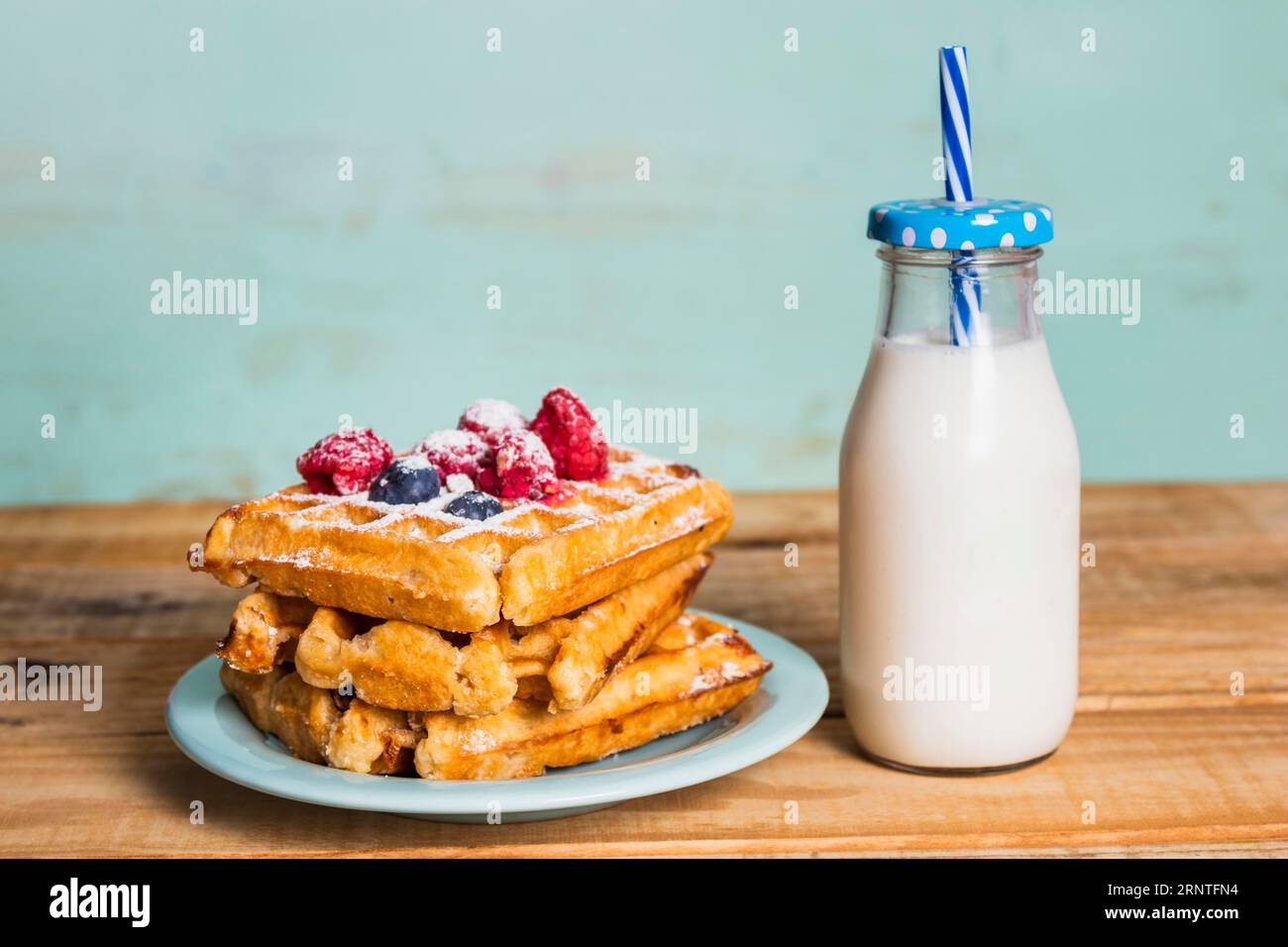 Simple breakfast with waffles milk Stock Photo - Alamy