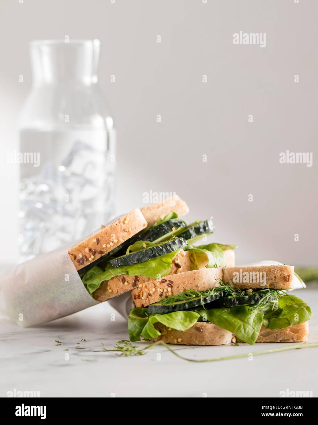 Front view sandwiches with greens cucumber Stock Photo - Alamy