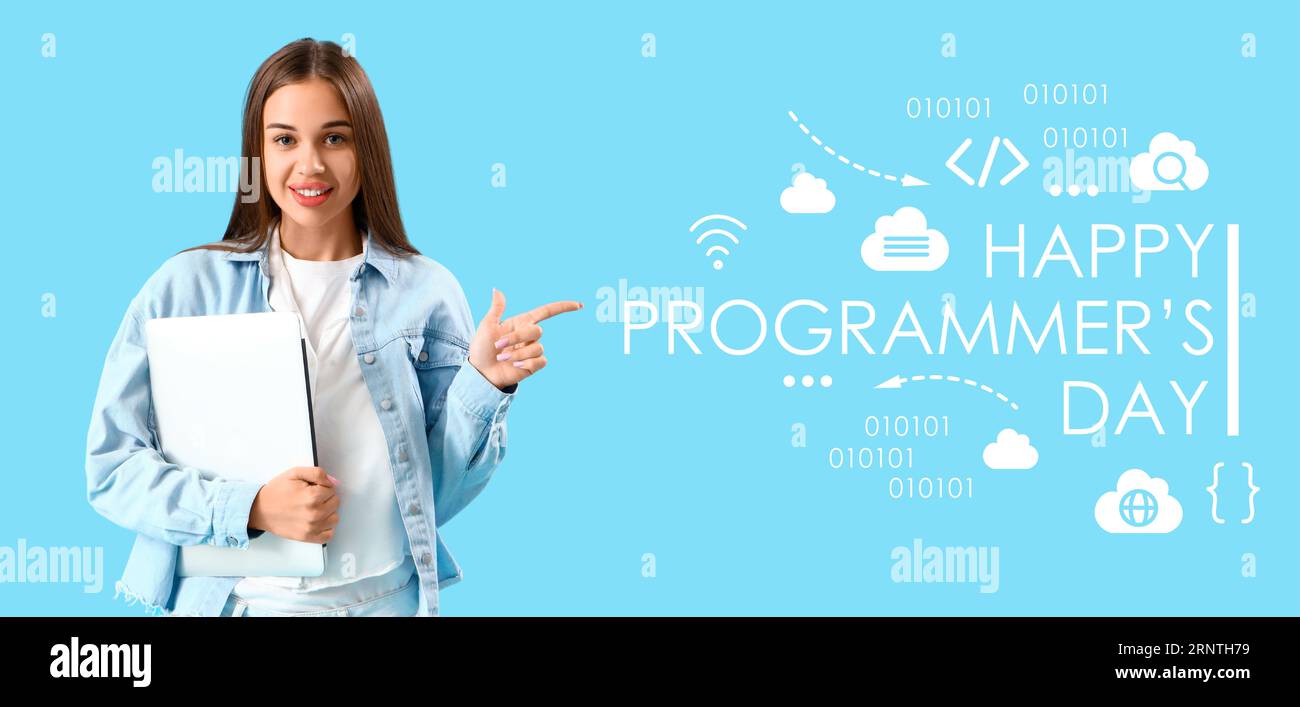Young woman with laptop and text HAPPY PROGRAMMER'S DAY on light blue ...