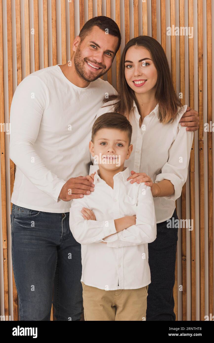 Adorable family posing together Stock Photo - Alamy