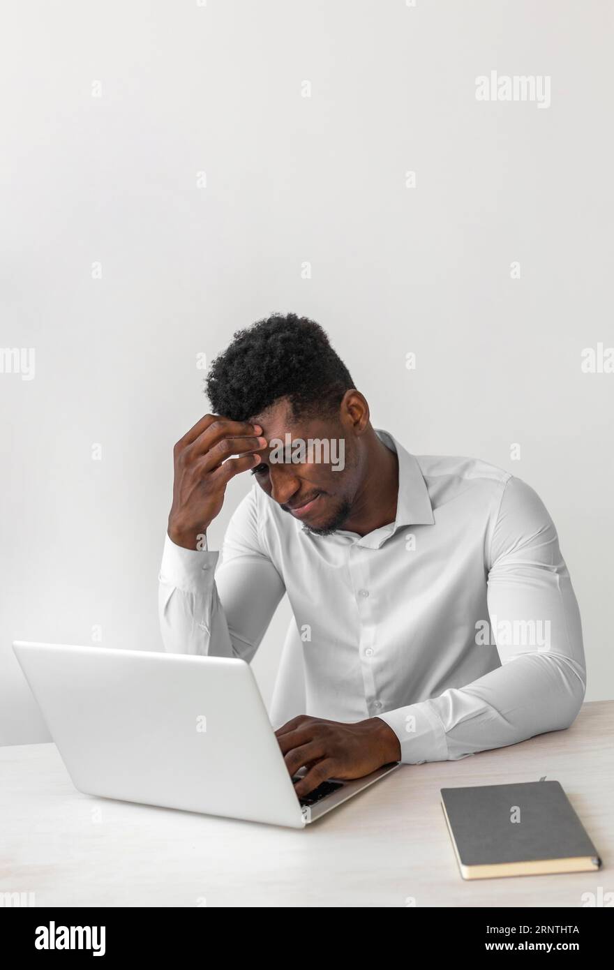 Pensive african businessman staff hi-res stock photography and images ...