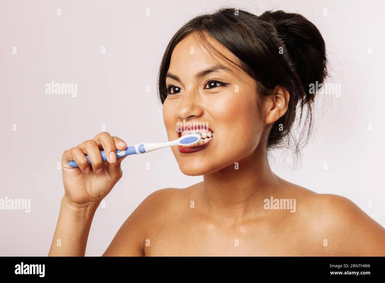 Young positive brunette latin hi-res stock photography and images - Alamy
