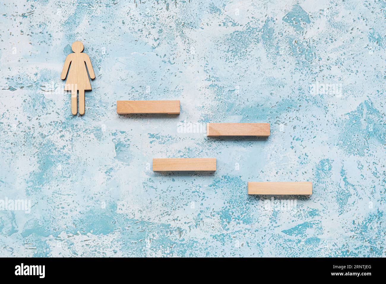 Wooden female figure with blocks on grunge background. Logic concept ...