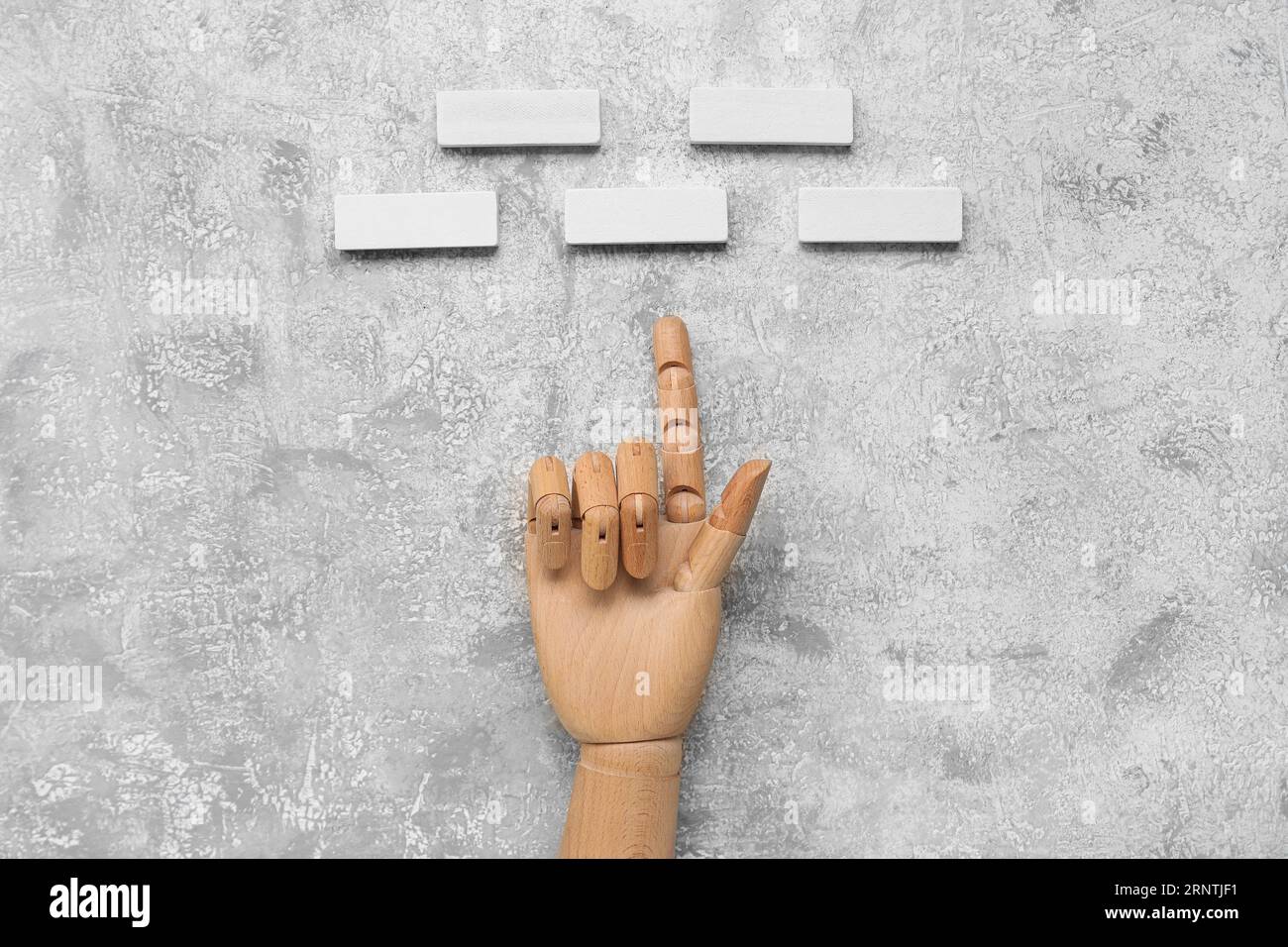 Wooden hand with blocks on grunge background. Logic concept Stock Photo ...