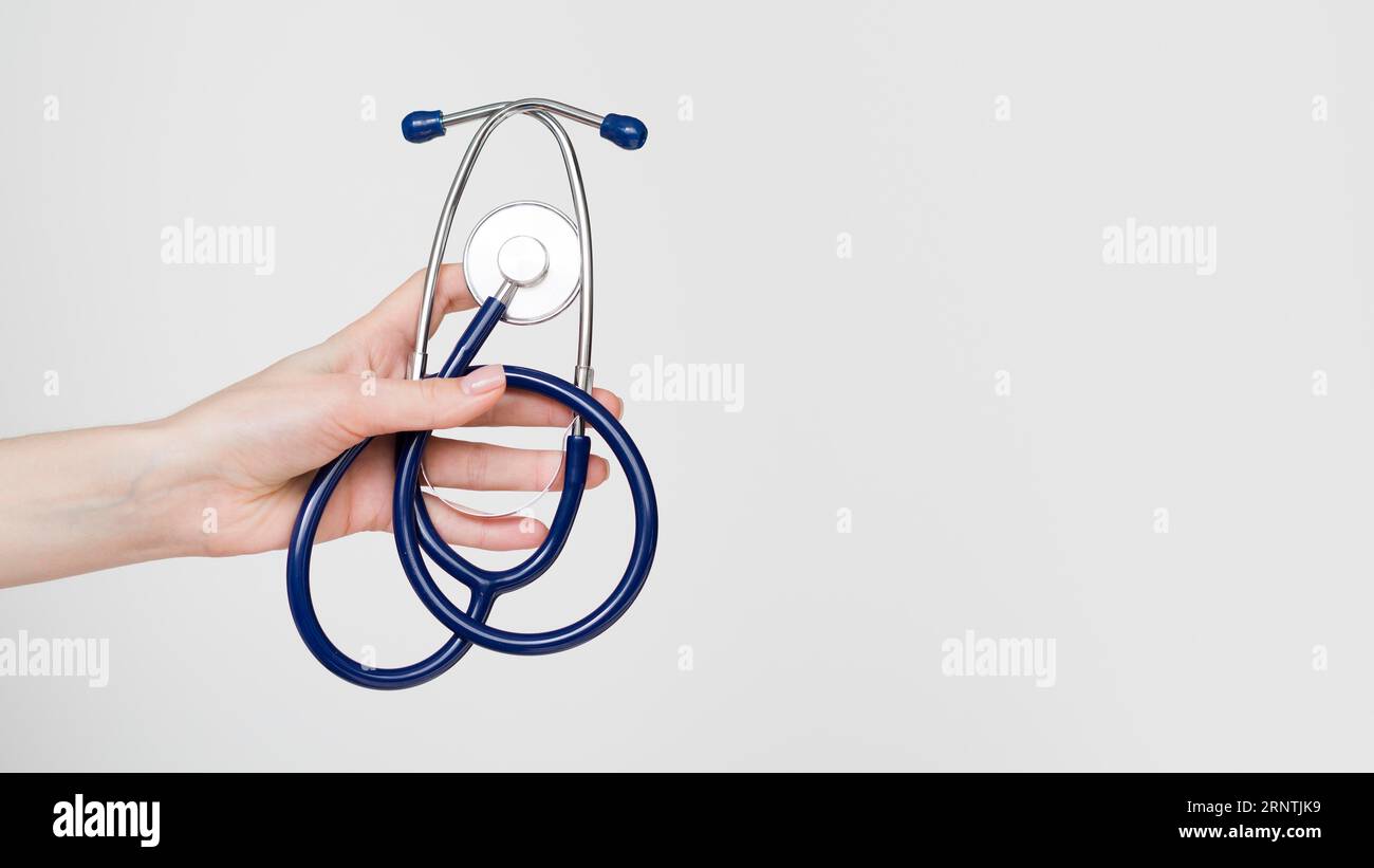 Close up hand holding stethoscope Stock Photo - Alamy