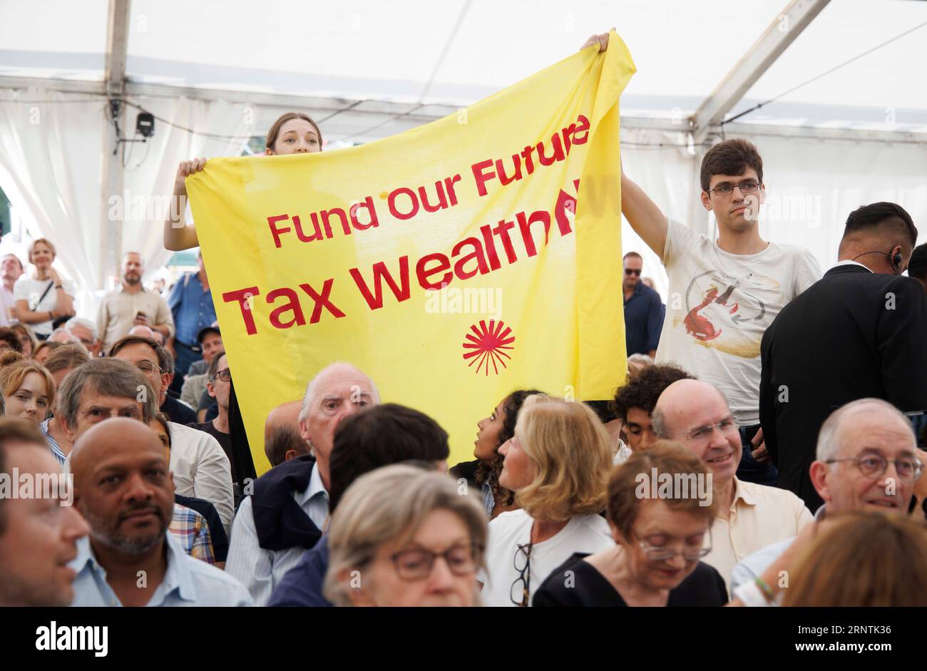 London, UK. 2nd Sep, 2023. Protestor hold up a banner saying Ô Tax ...