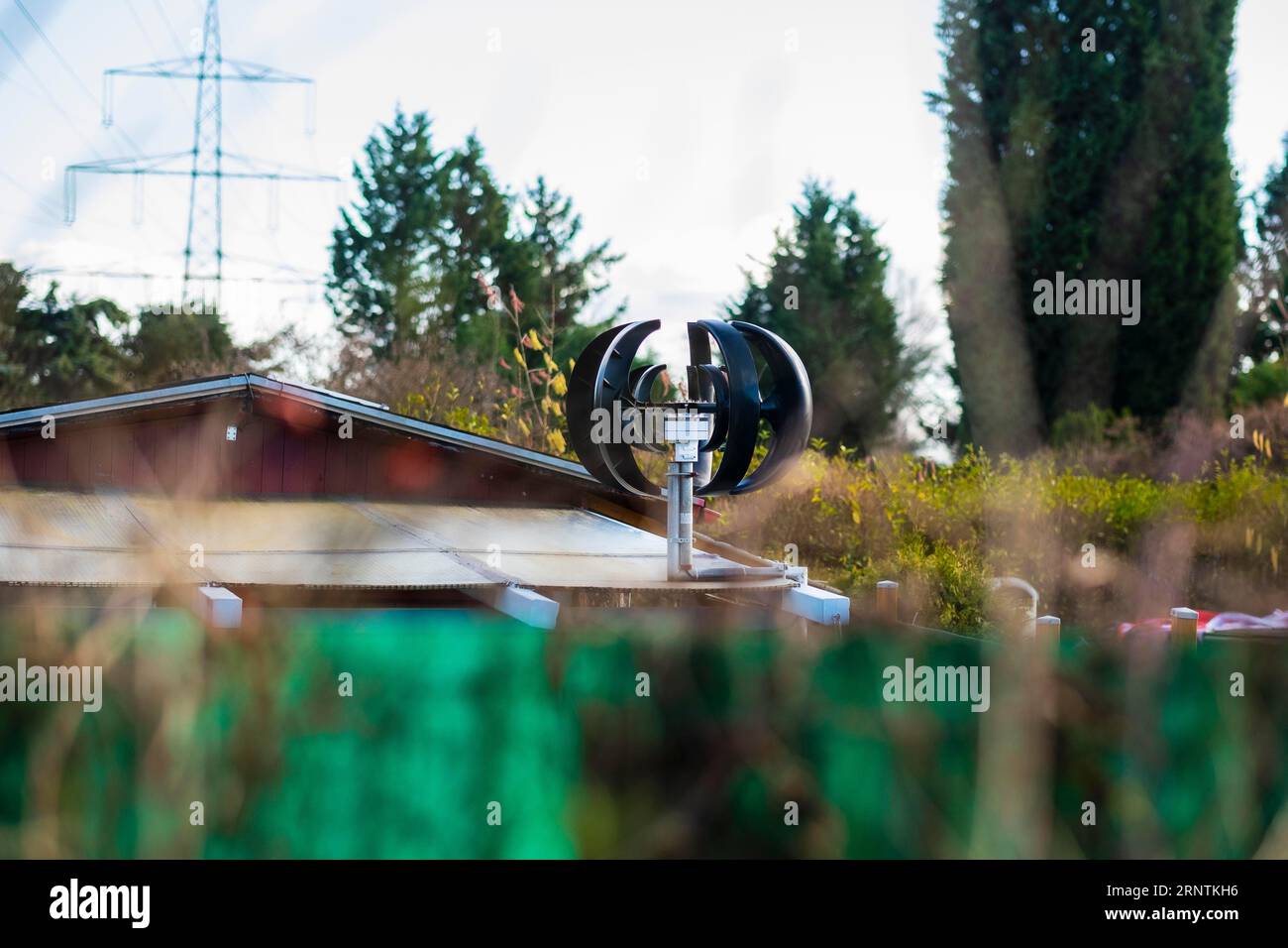 Small wind turbine on roof hi-res stock photography and images - Alamy