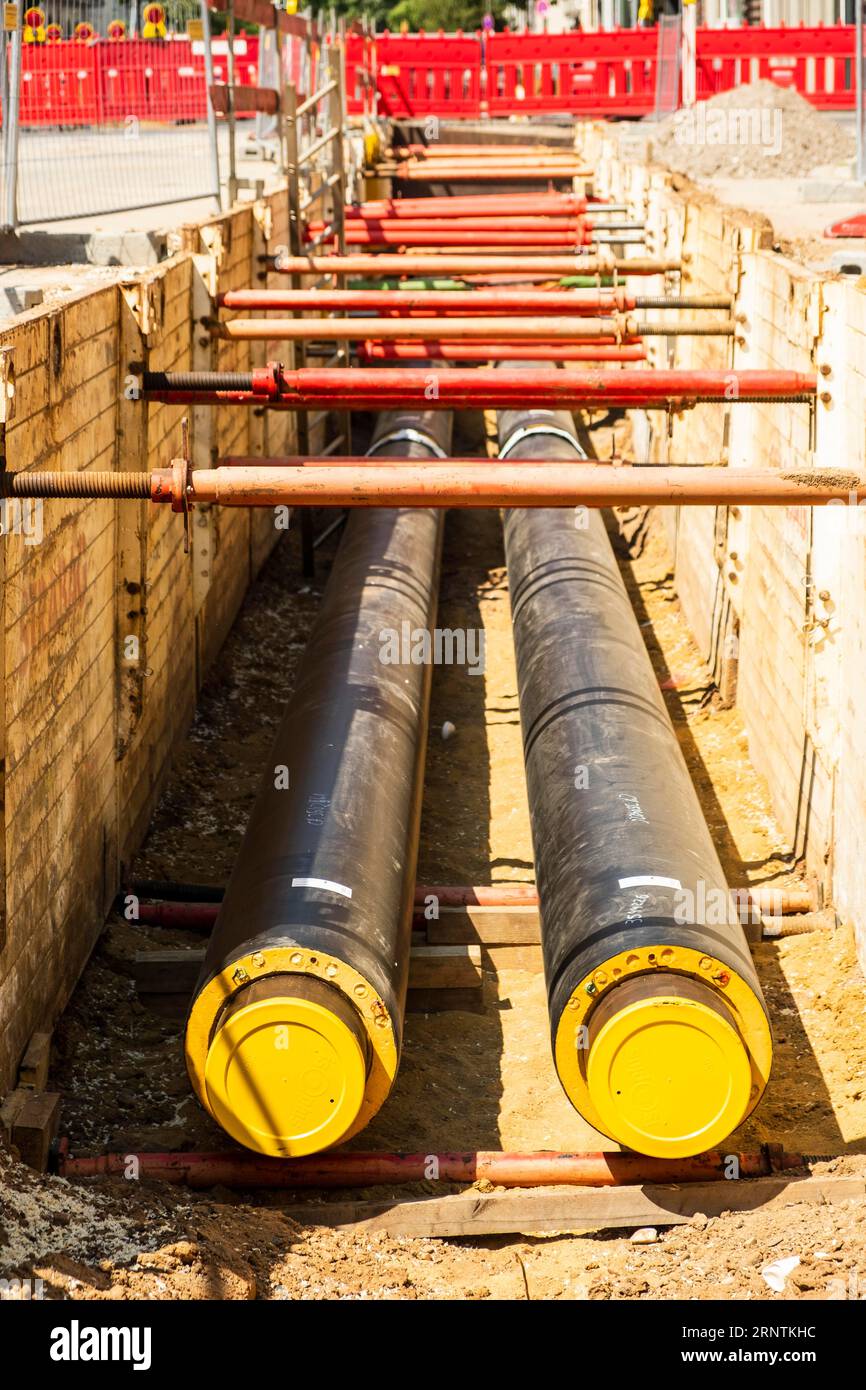 Construction work on a new district heating pipeline for the use of ...