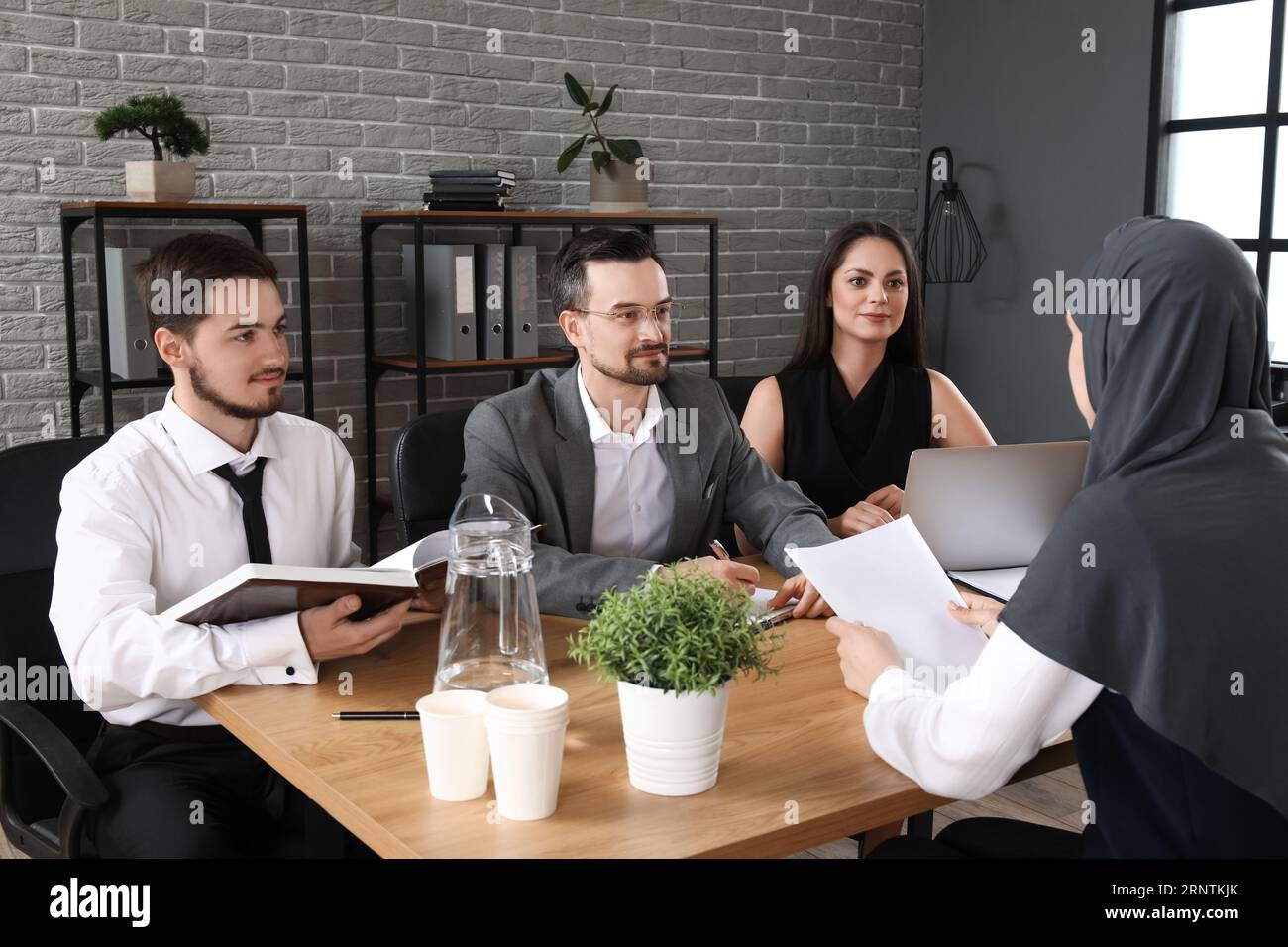Muslim women job interview hi-res stock photography and images - Alamy
