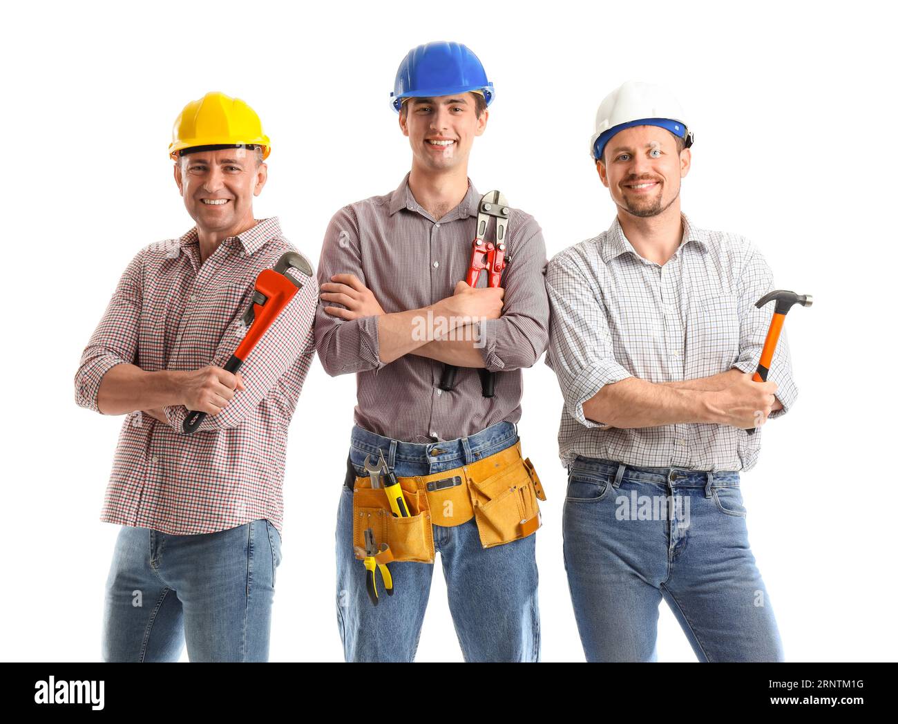 Team of male builders with tools on white background Stock Photo - Alamy