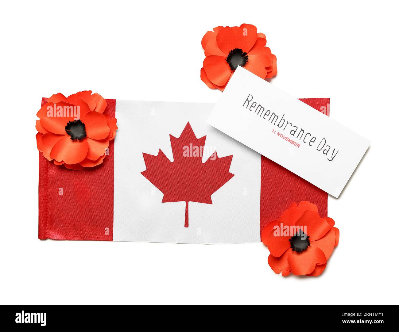 Poppy flowers, flag of Canada and card on white background. Remembrance ...
