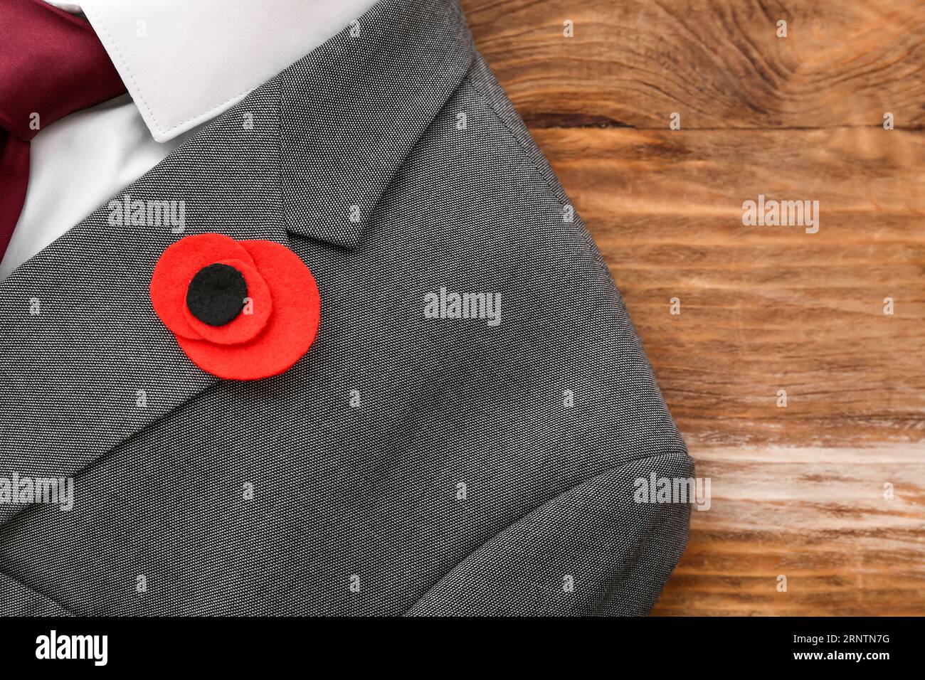 Poppy flower pinned on male suit. Remembrance Day in Canada Stock Photo ...
