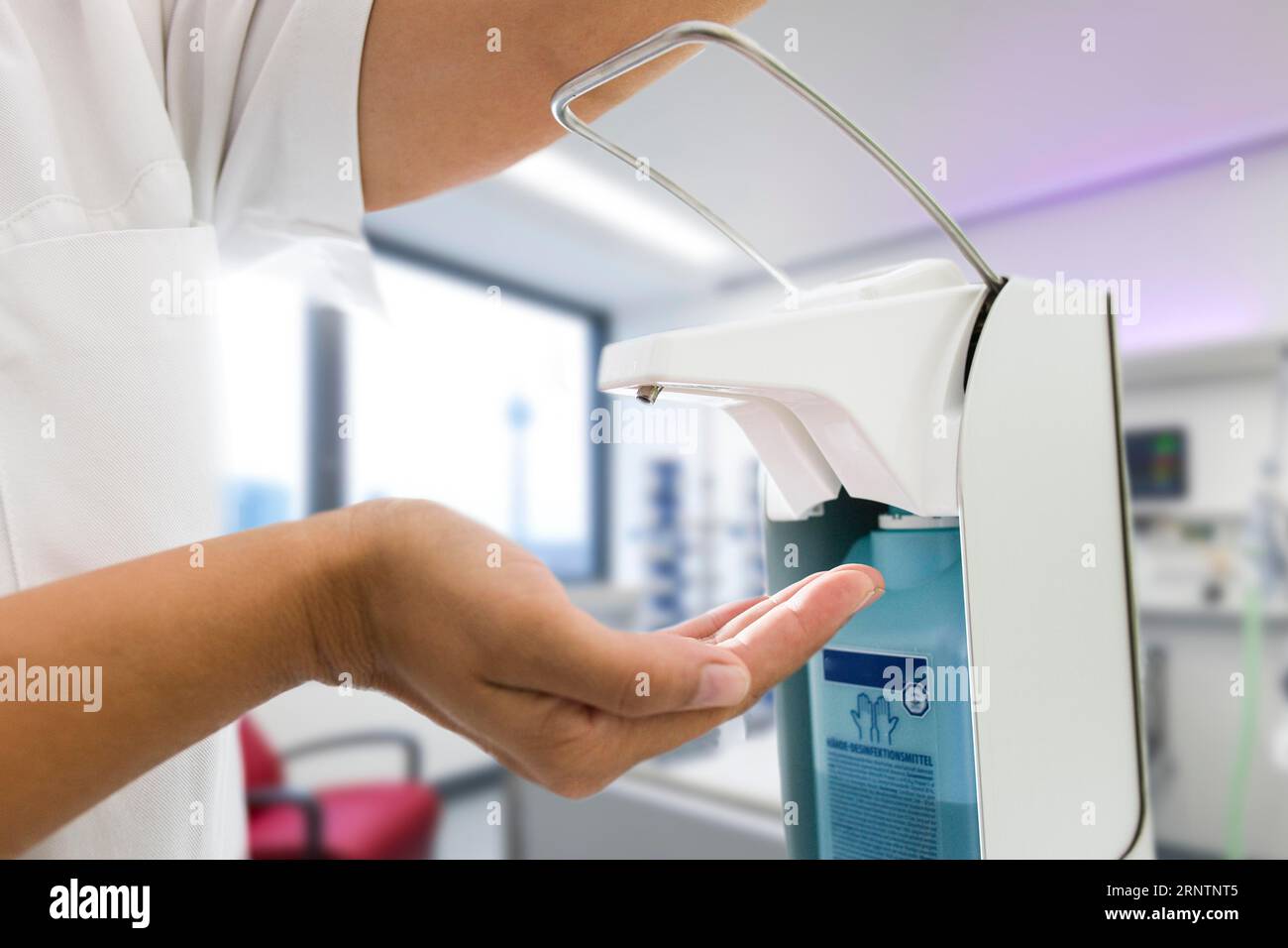 Hand disinfection in hospitals, nurses, dispensers Stock Photo - Alamy