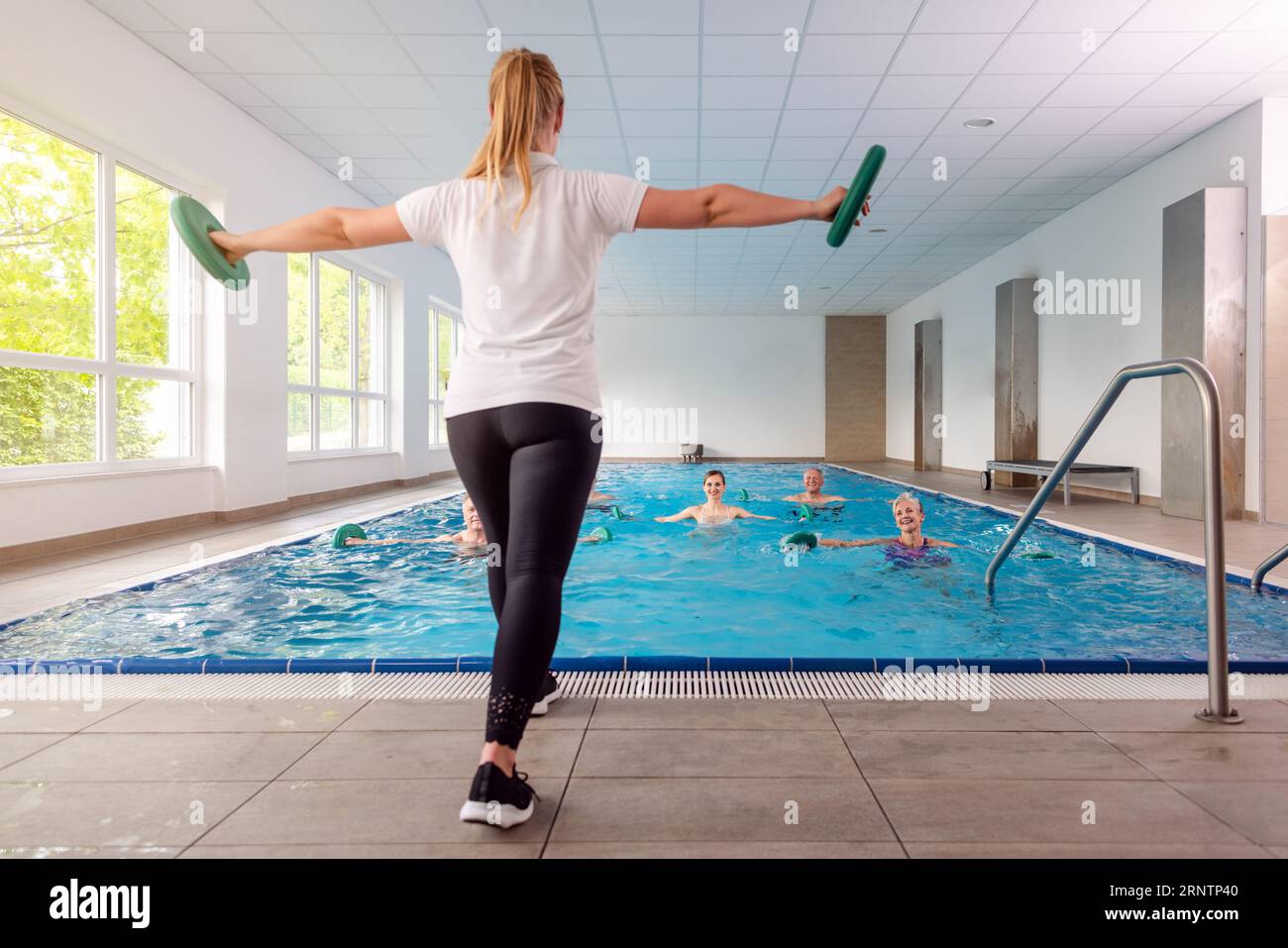Training class in water gymnastics at a rehabilitation gym Stock Photo ...