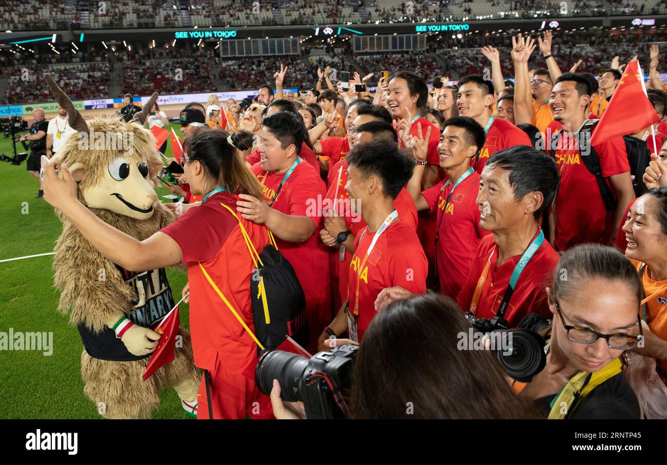 Mascot Youhuu celebrates with the Chinese team during the closing ...