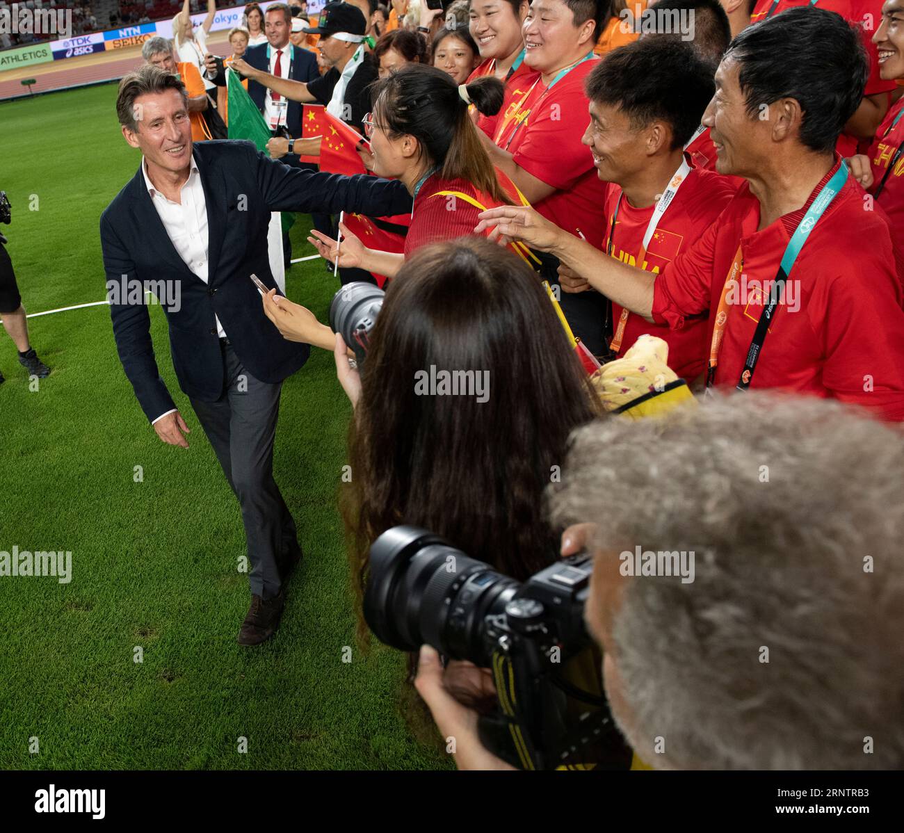 Sebastian Coe President of World Athletics greets volunteers and team ...