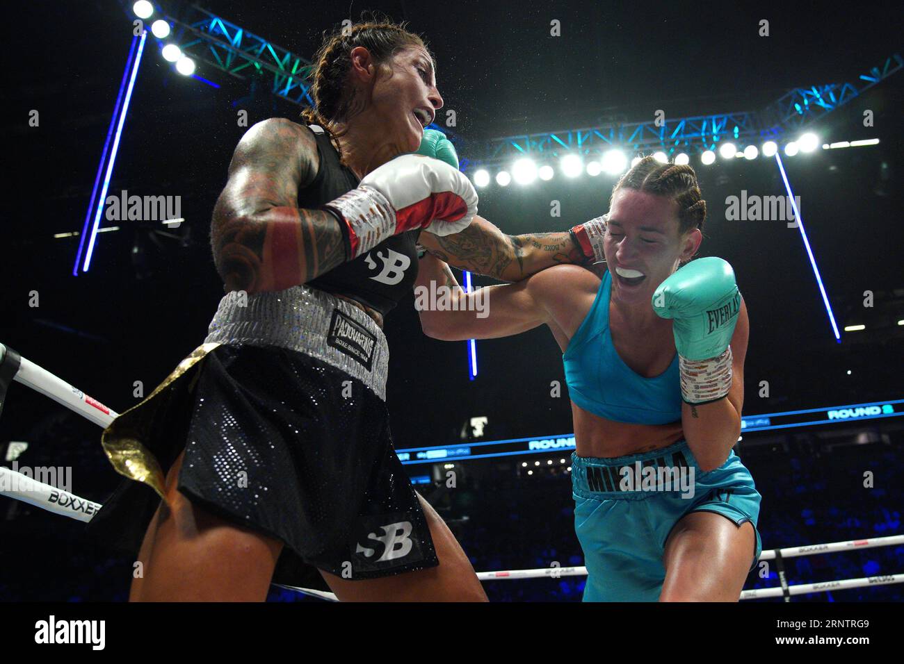 Silvia Bortot (left) strikes Mikaela Mayer in the Super-Lightweight ...