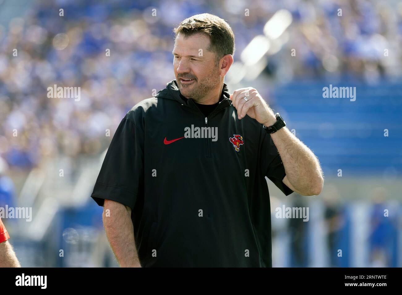 Ball State head coach Mike Neu smiles before taking on Kentucky in an ...