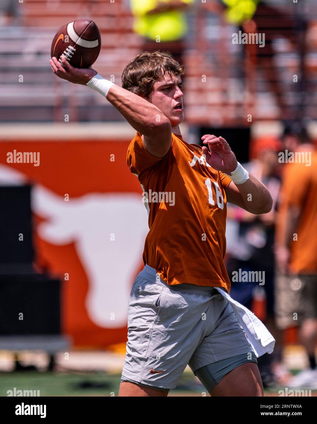 Sept 2, 2023. Arch Manning #16 of the Texas Longhorns warming up before ...