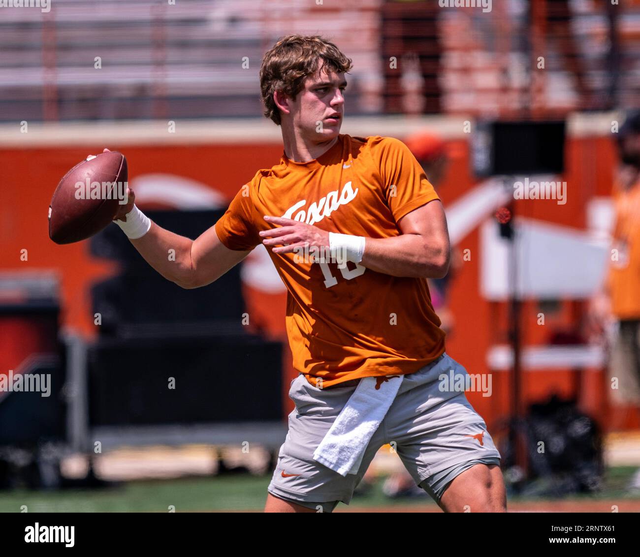 Sept 2, 2023. Arch Manning #16 of the Texas Longhorns warming up before ...