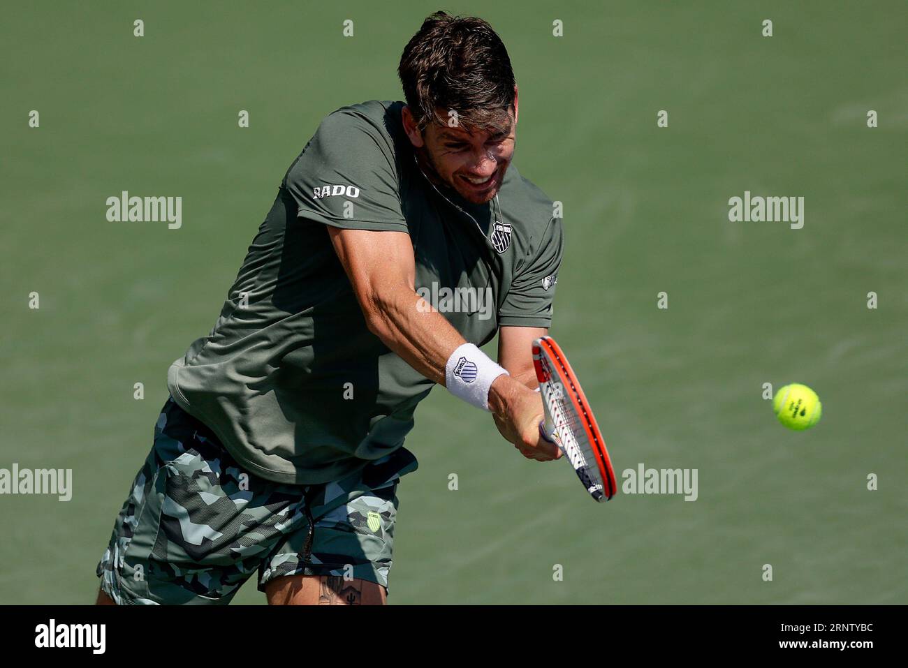 Cameron Norrie, of Great Britain, returns a shot to Matteo Arnaldi, of ...