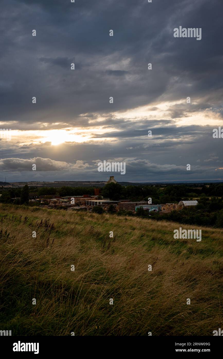South Yorkshire landscape in evening light with dark clouds in August ...