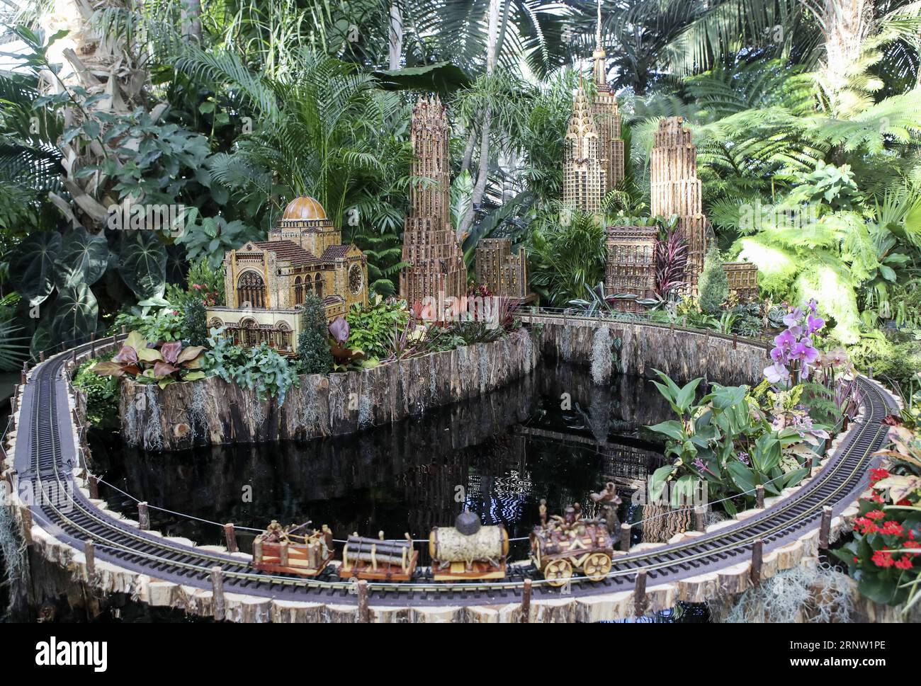 (171128) -- NEW YORK, Nov. 28, 2017 -- A model train passes by the ...