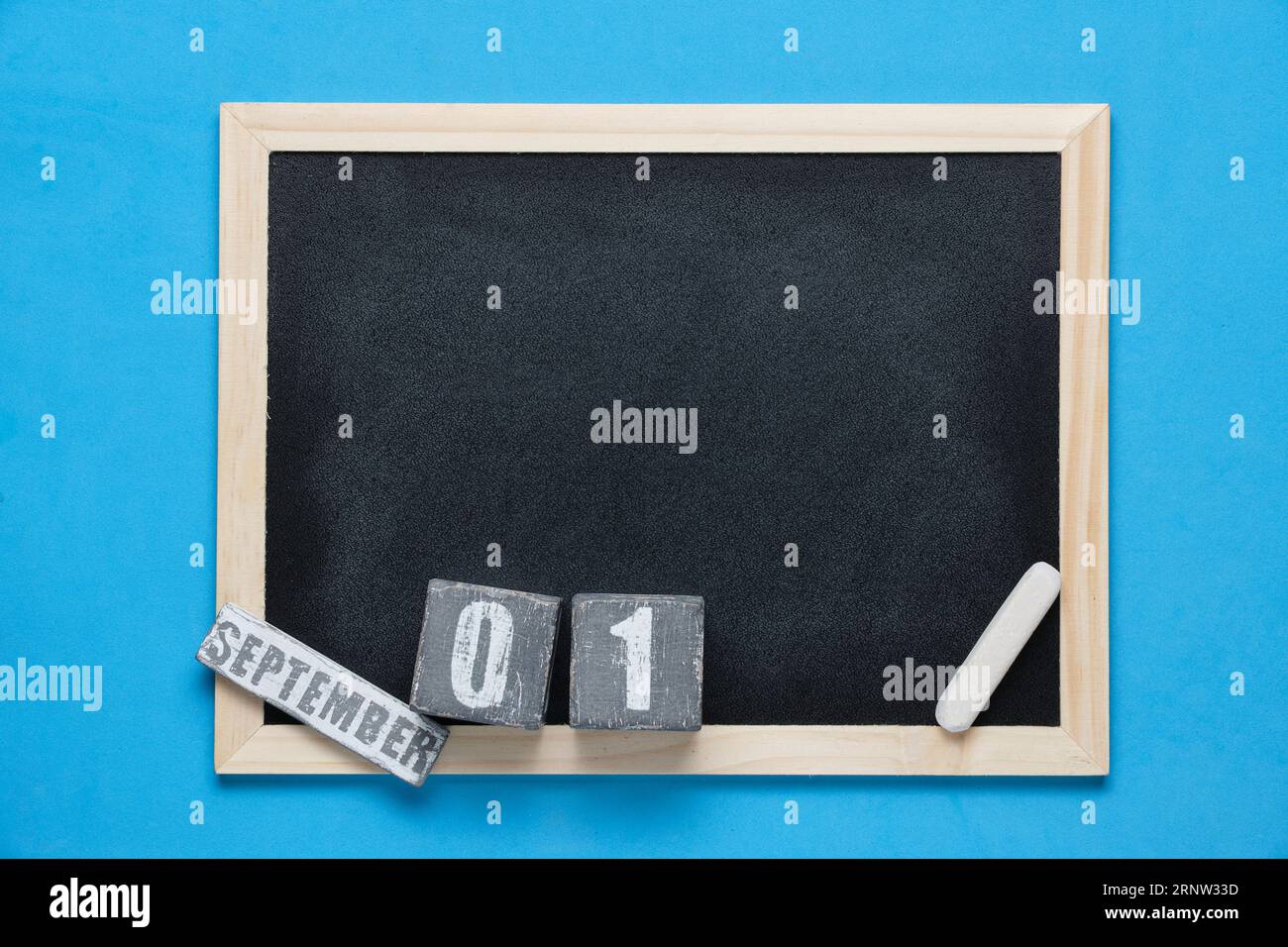 Blackboard with chalk blue background and September 01 on calendar ...