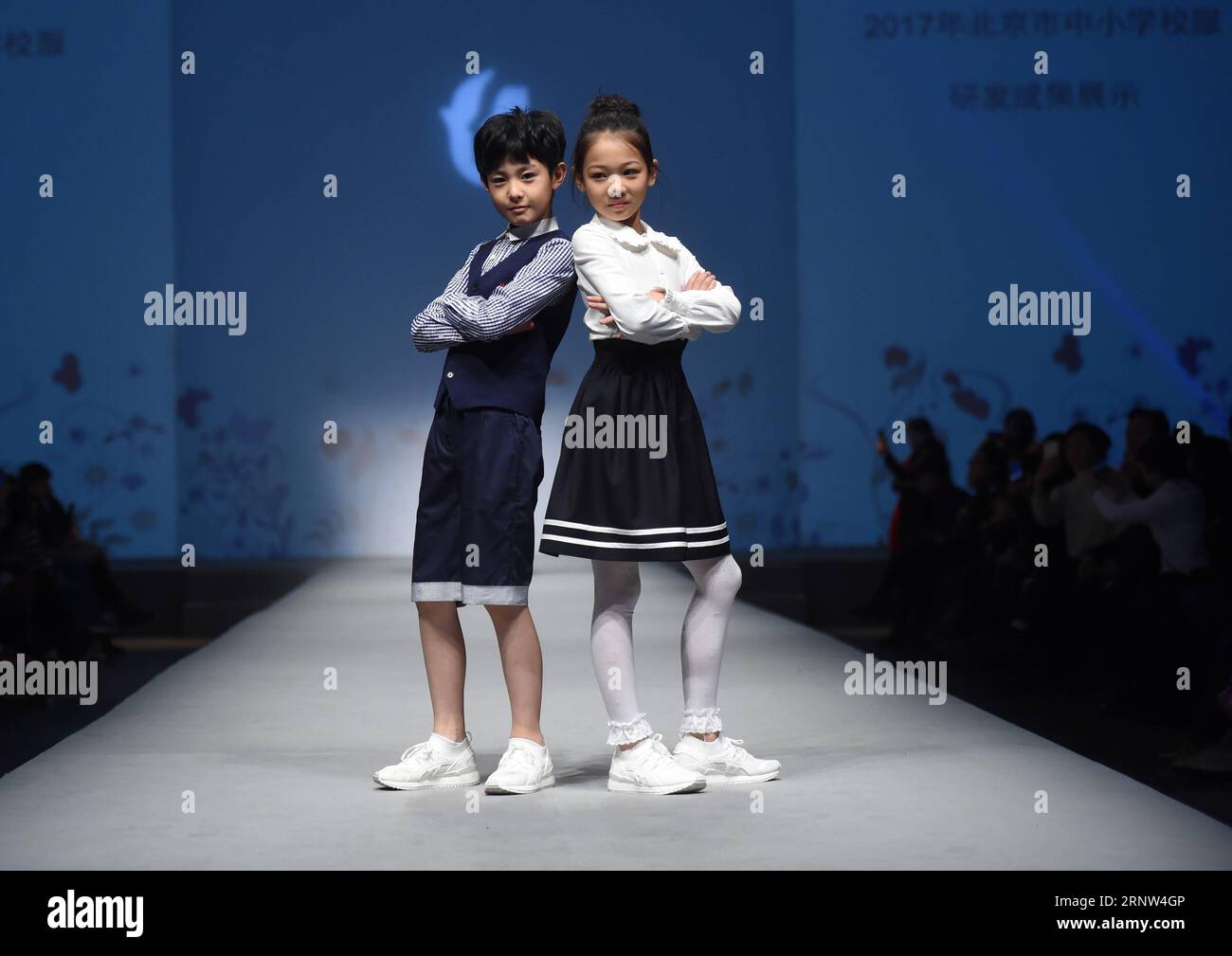 (171203) -- BEIJING, Dec. 3, 2017 -- Student models present school ...