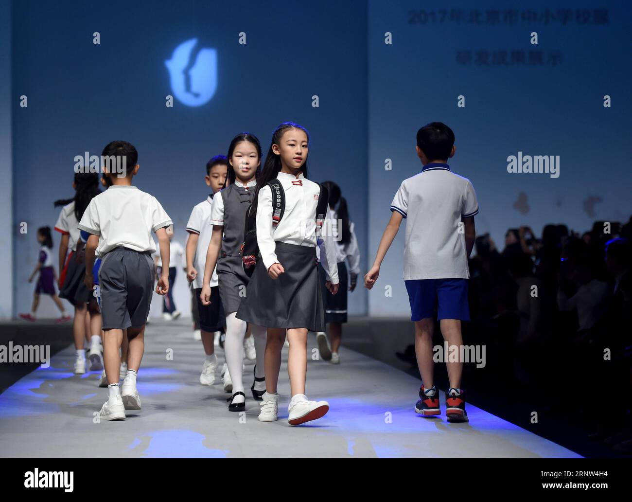 (171203) -- BEIJING, Dec. 3, 2017 -- Student models present school ...