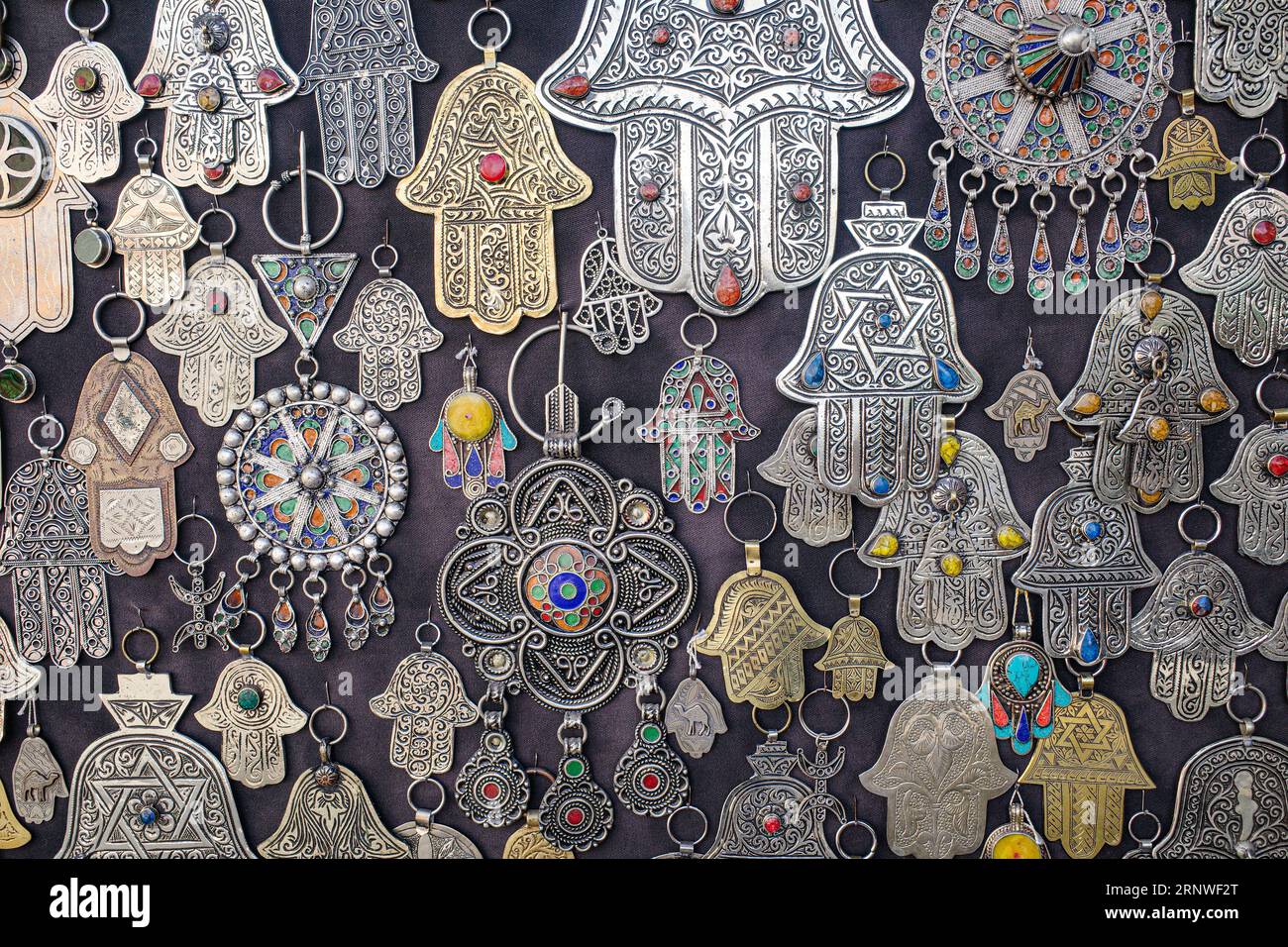 Marrakech, Morroco - Feb 10, 2023: Metal charms and pendants in the ...