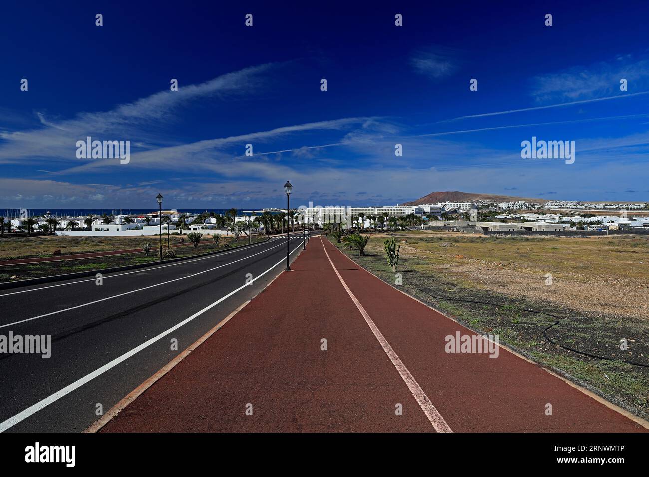 Long straight road and pavement, Playa Blanca, Lanzarote, Canary ...