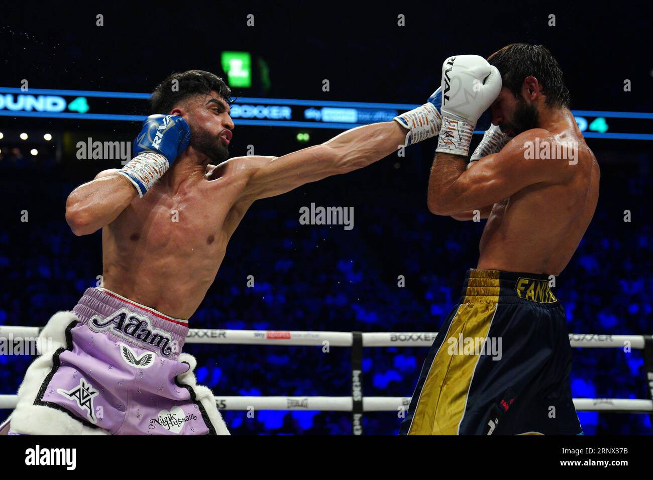 Adam Azim (left) in action against Aram Fanyan in the Super-Lightweight ...