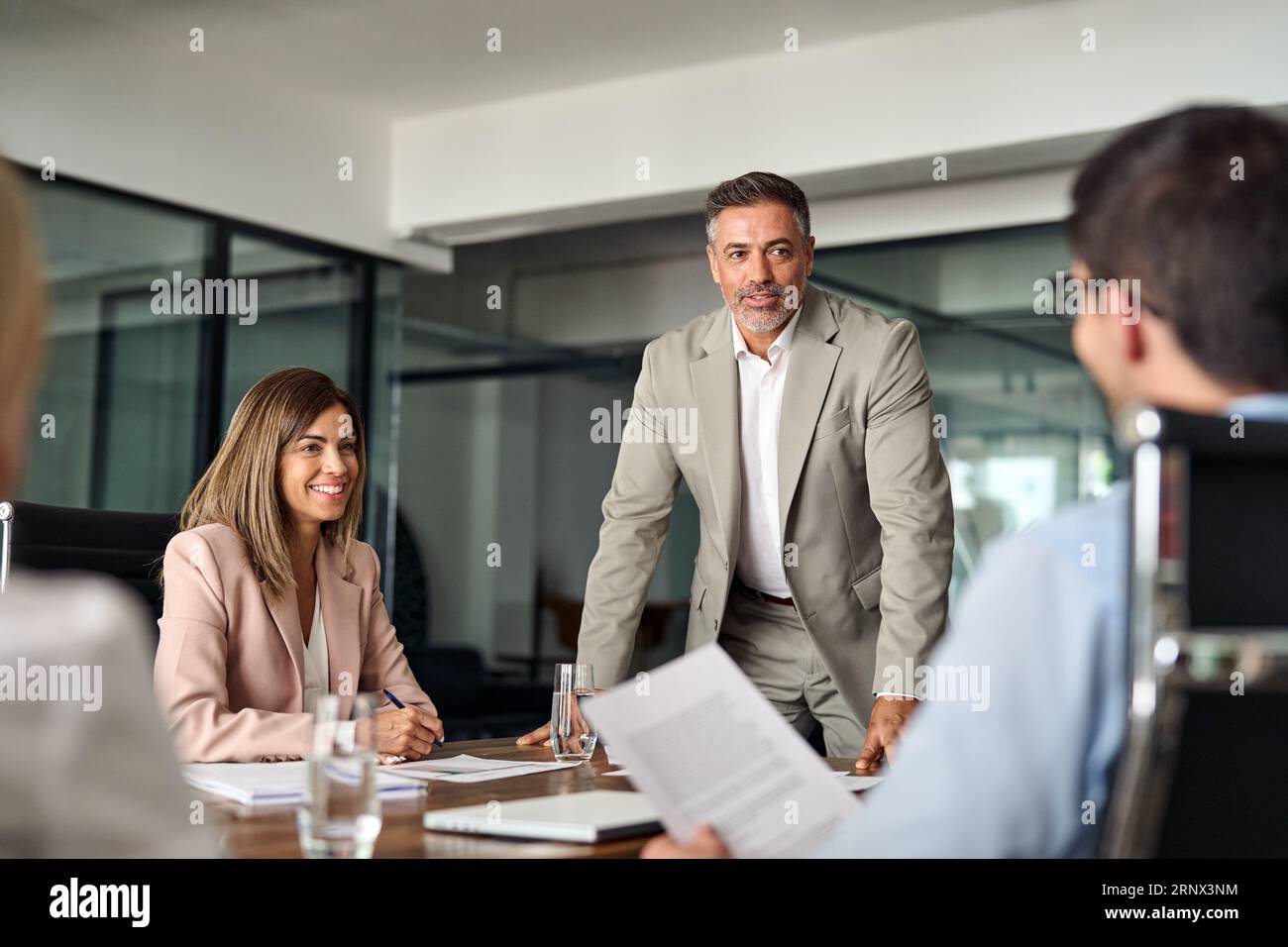 Happy executive manager and team people having discussion at office ...