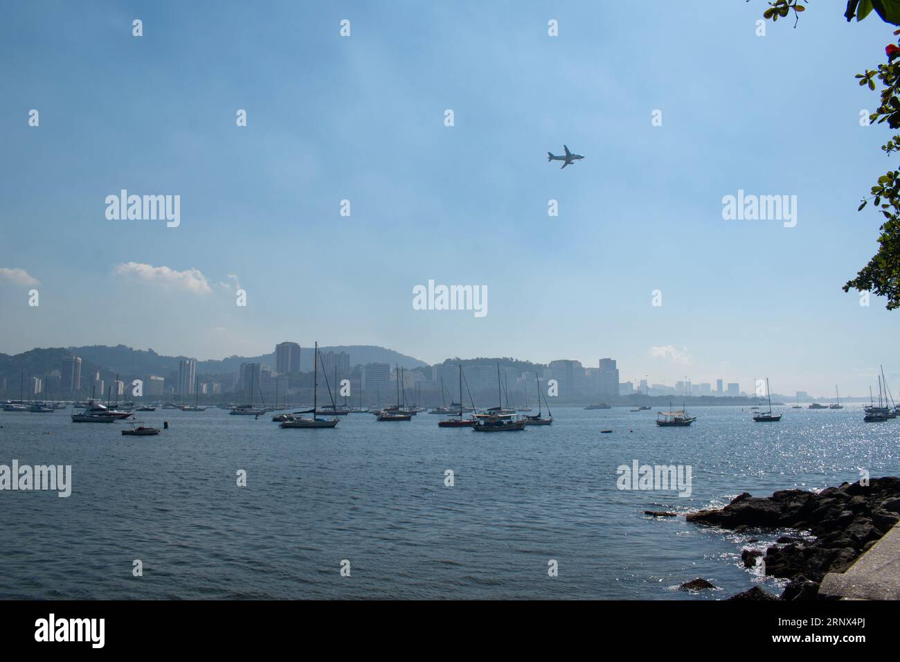 Urca, Rio de Janeiro, Brazil: plane landing, view of Guanabara Bay and ...