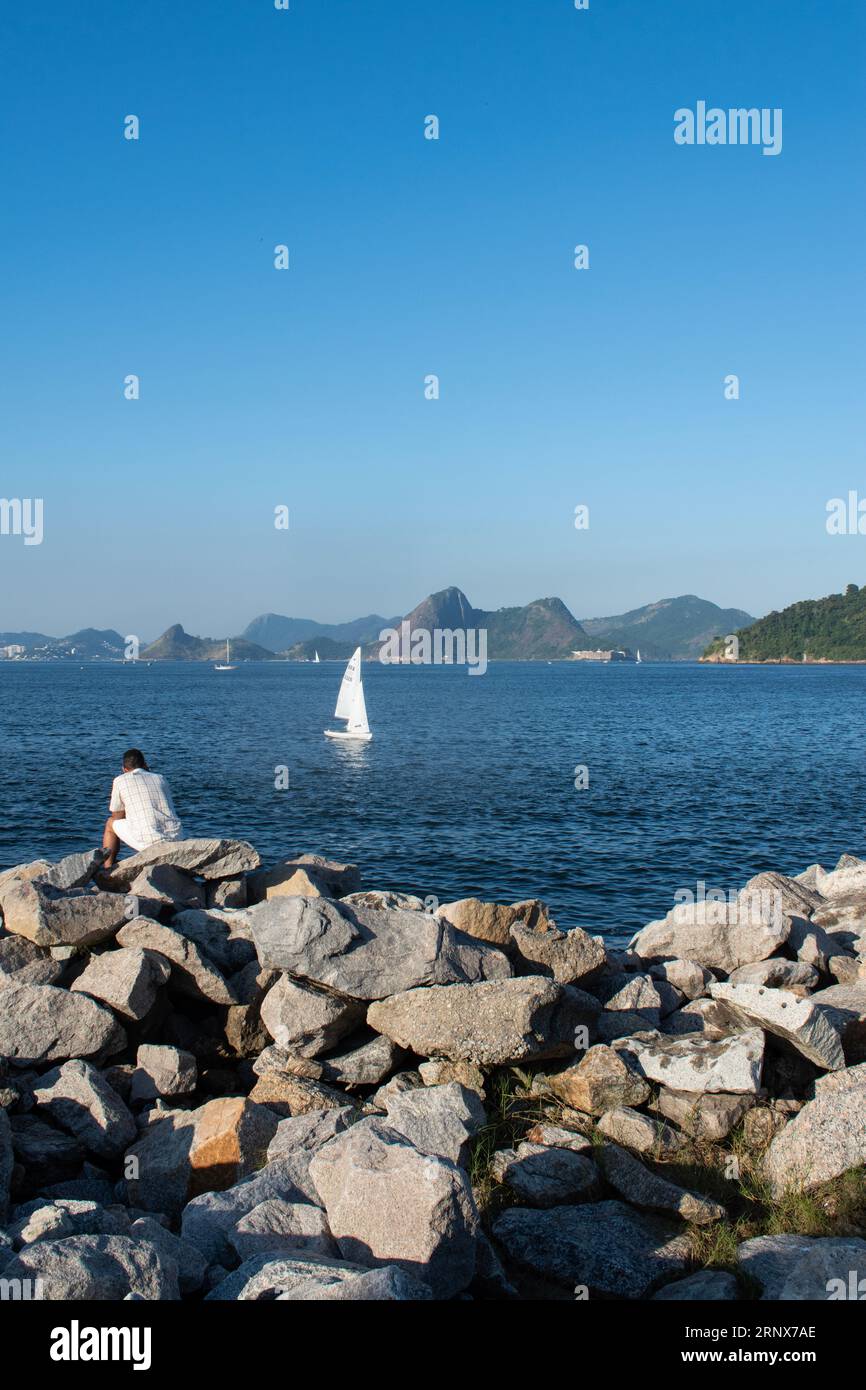 Rio de Janeiro, Brazil: man relaxing in the Flamengo Park (Aterro do ...
